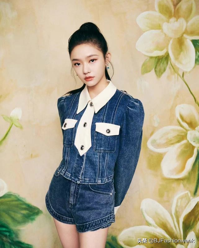 Lin Yun wears a denim suit with white embellishments, which is playful ...