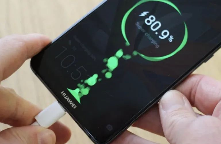 Charge the phone to 100% and then unplug it? Turns out we were all ...