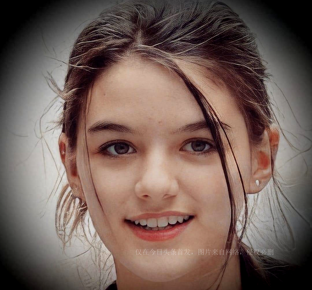 17-year-old Suri is fair-skinned and beautiful, and is taller than Tom ...