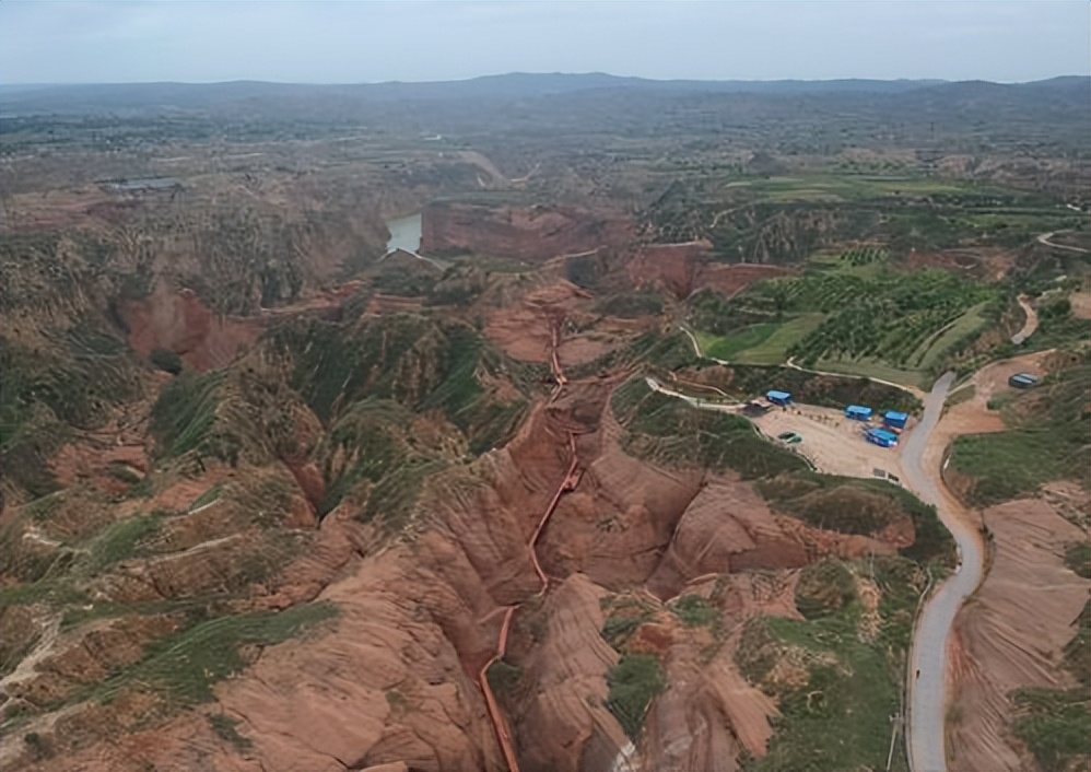 Aerial photography of Wave Valley, tourists stepping on the Danxia ...