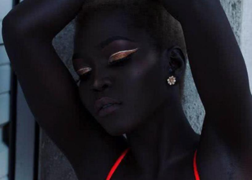 The world's blackest model, even the gums and lips are black, but the ...