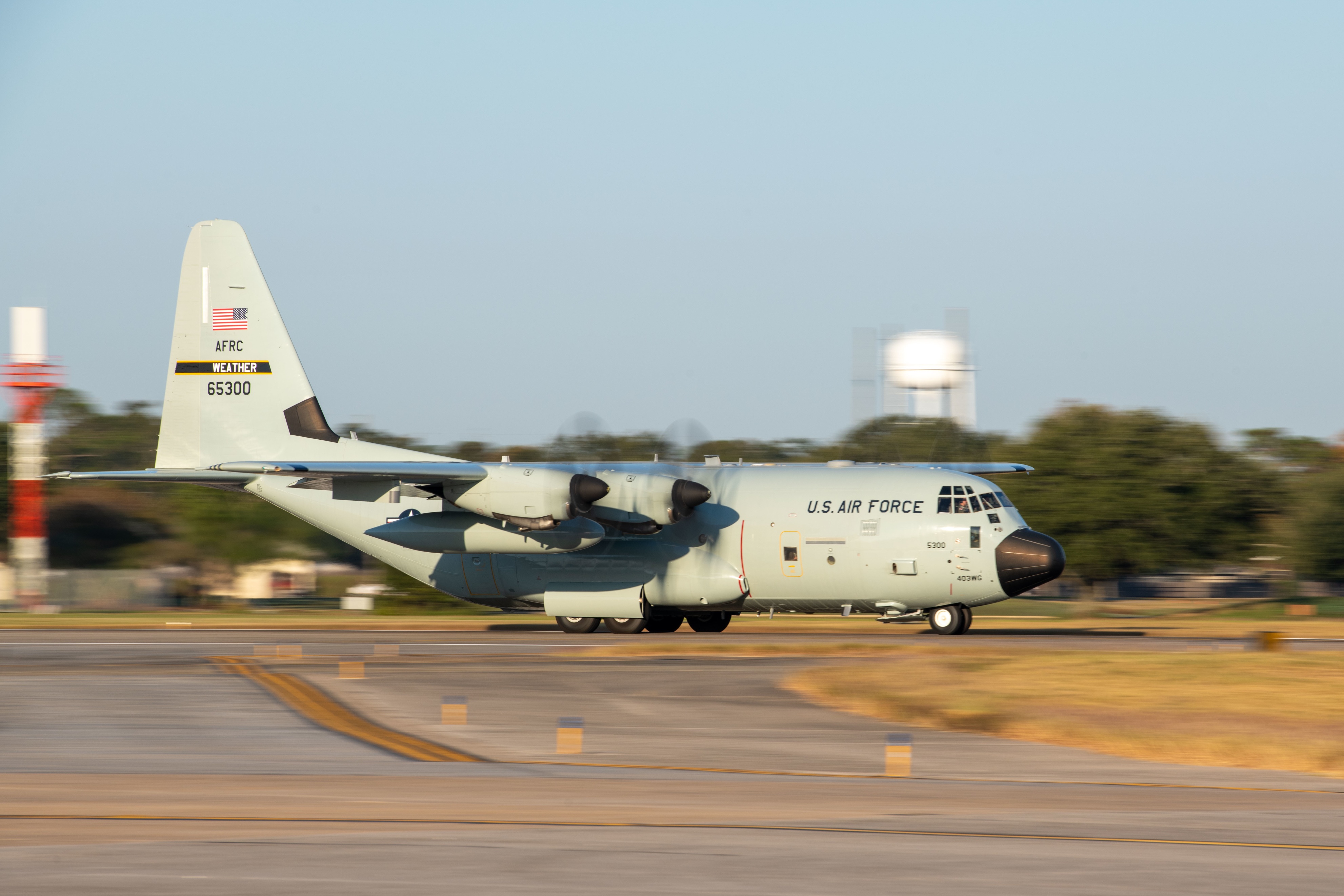 53rd Weather Reconnaissance Squadron taxiing on runway WC-130J - iNEWS