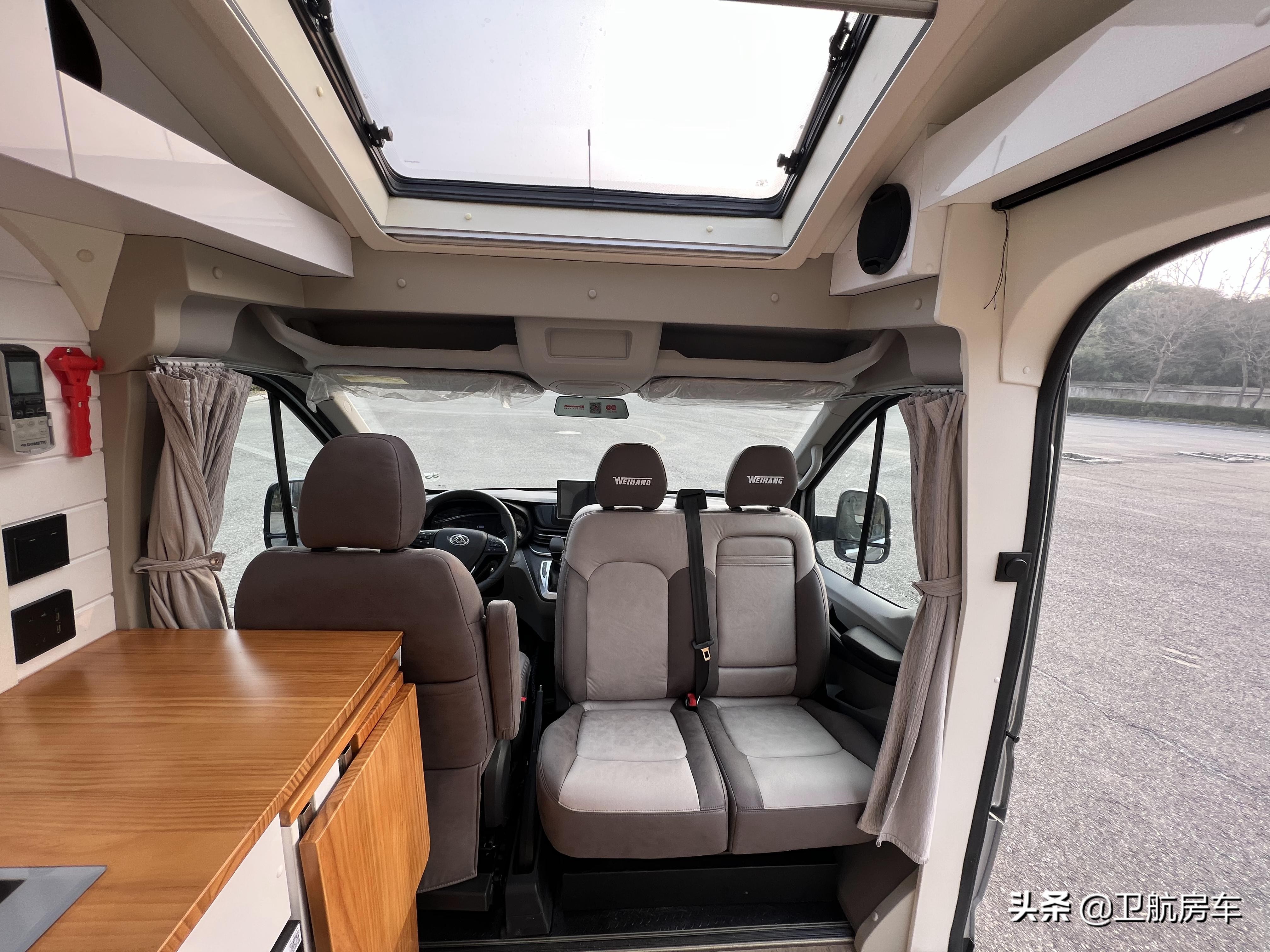 Customized panoramic sunroof Vanlife with dishwasher and cooker hood ...