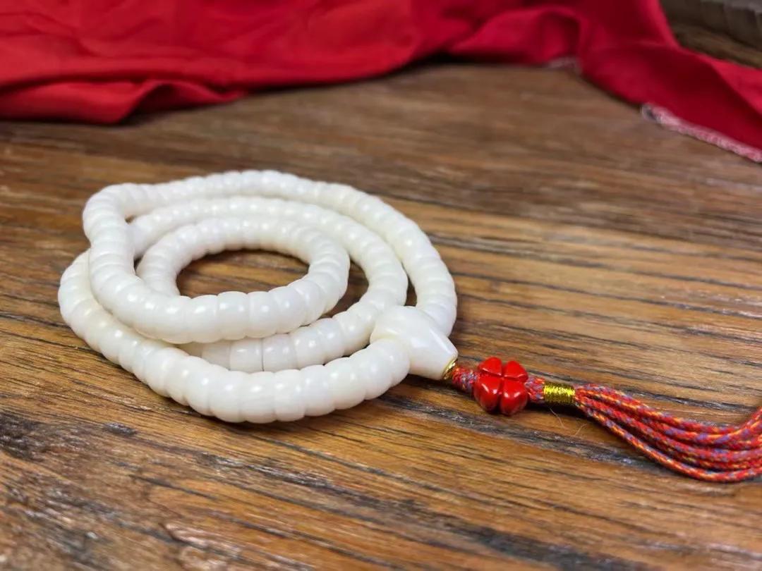 Wenwan, extremely oily, white and shiny, with beeswax tee and coral ...