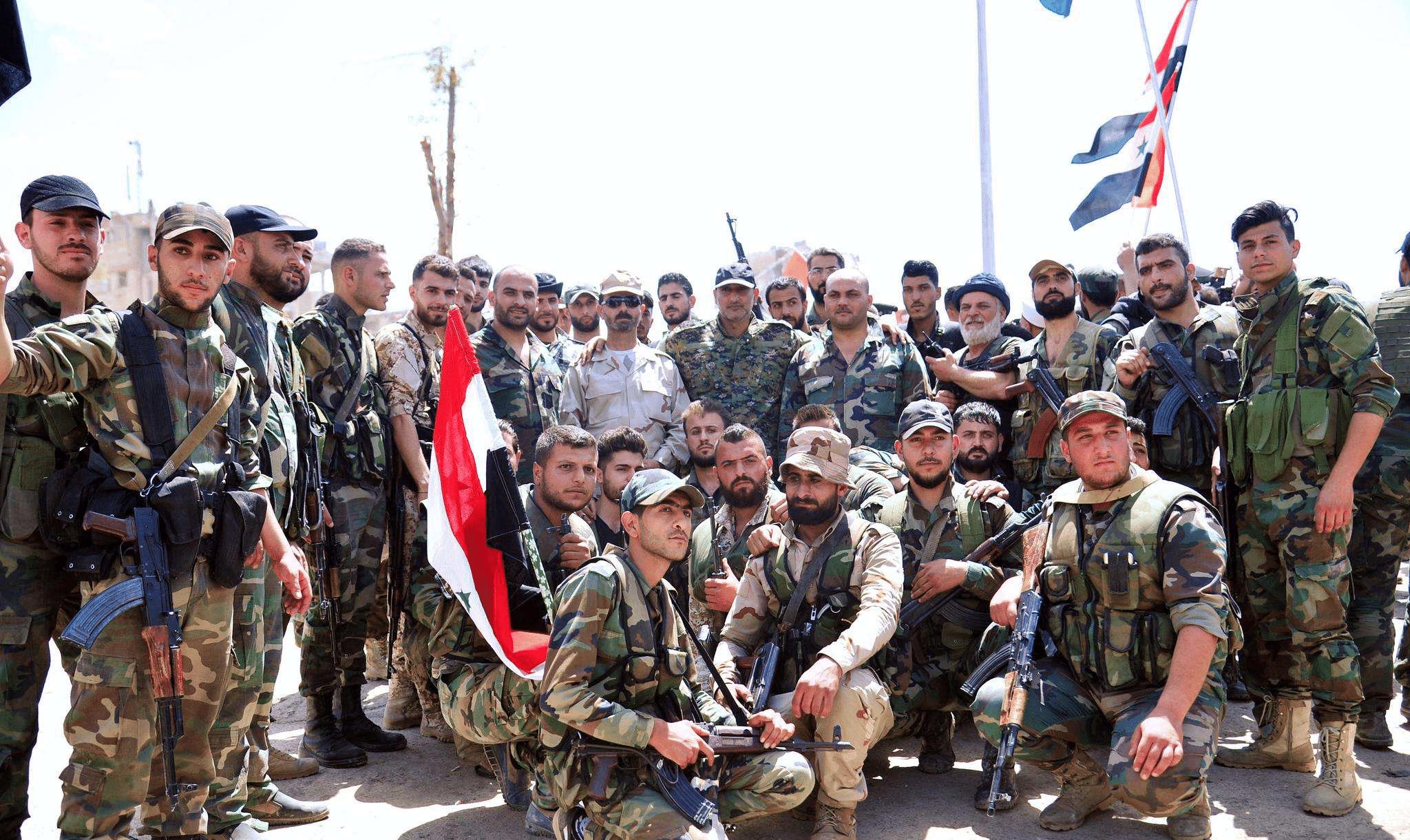 After a night of fierce fighting, the Syrian government forces ...