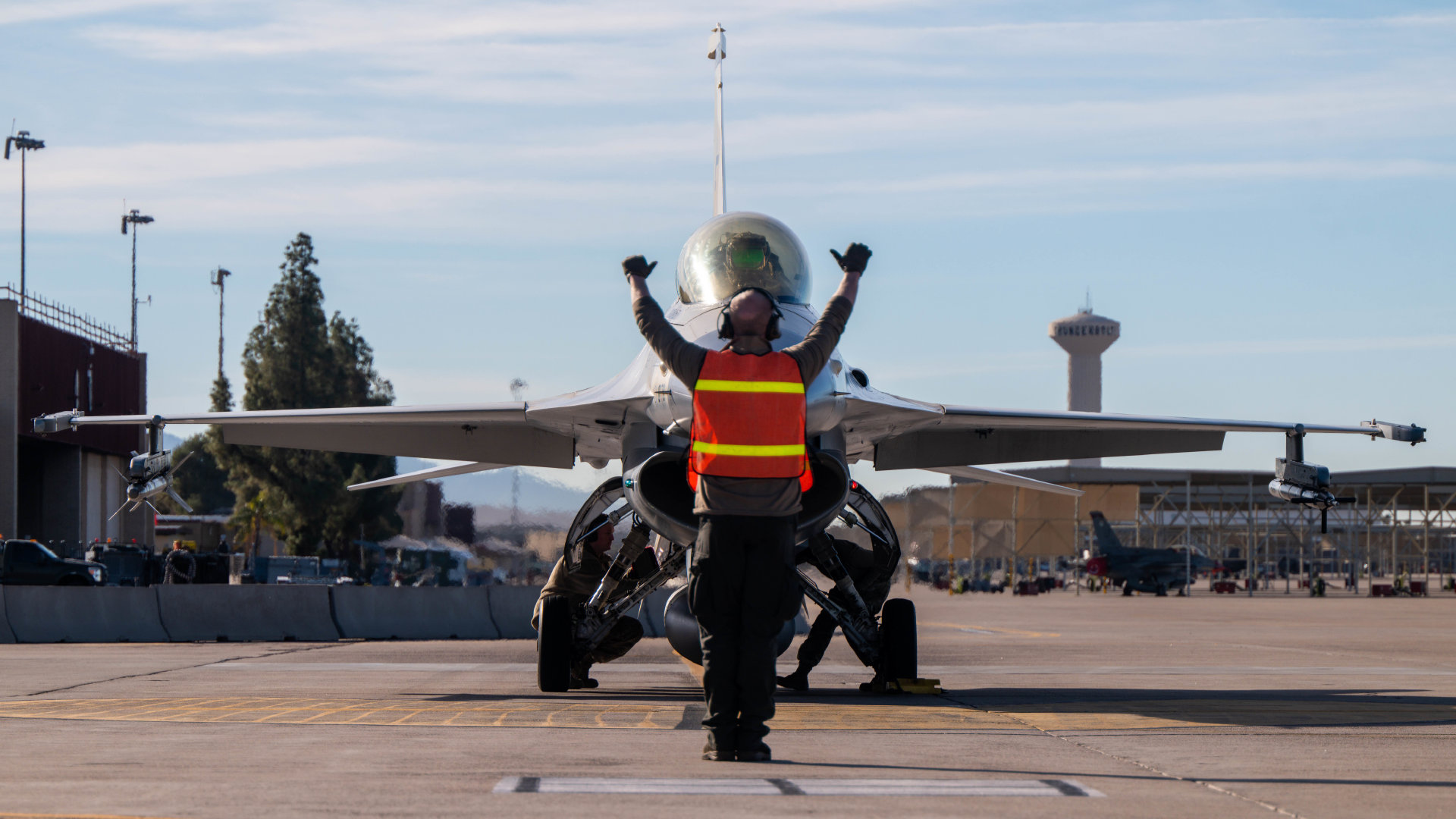 U.S. Air Force F-16 Fighting Falcons of the 309th Fighter Squadron taxi ...