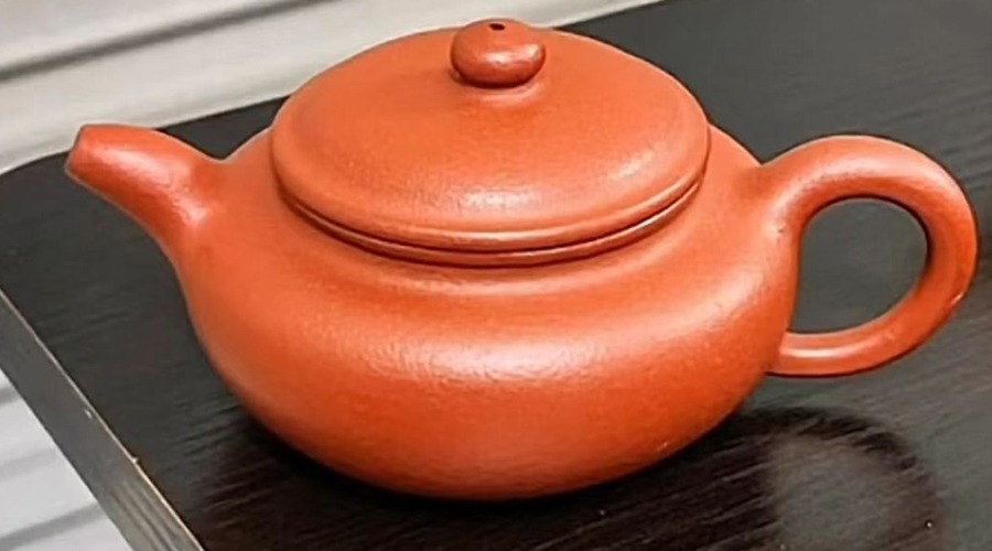 Yixing purple sand teapot is a folk handicraft - iMedia