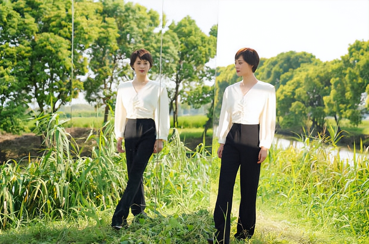 Sun Li wears a black and white color matching capable suit to ...