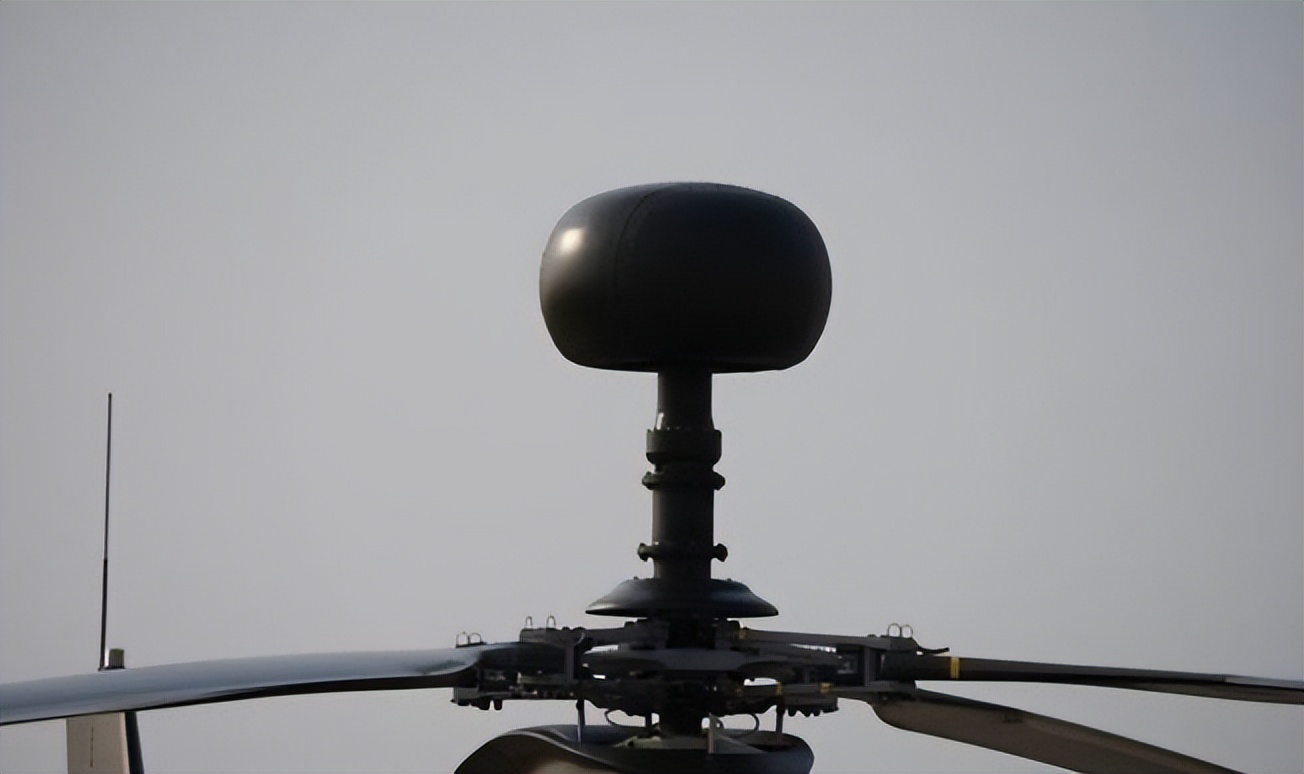 Why do some armed helicopters have a "ball" on top?What is this "ball ...