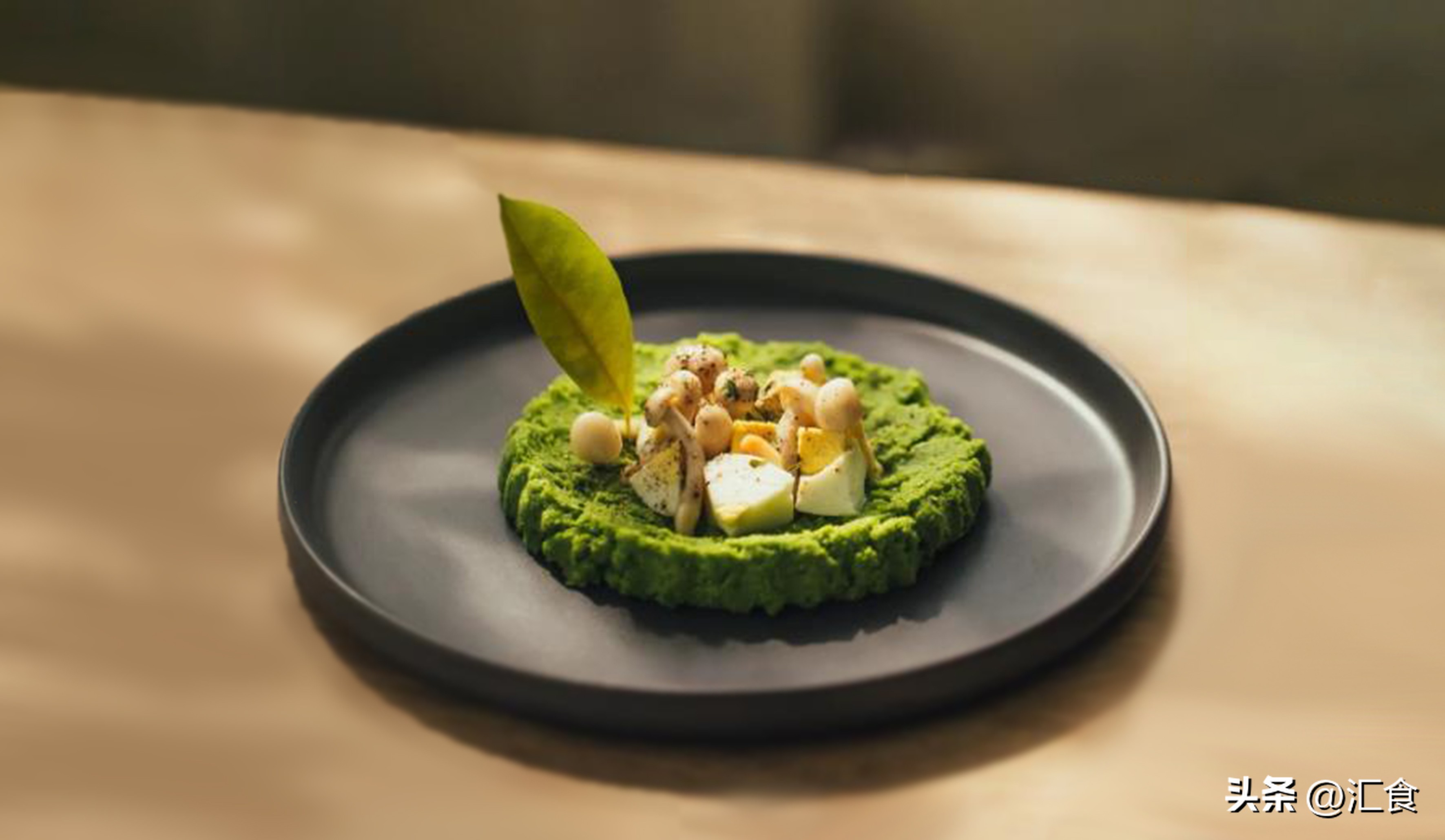 Crispy pork fillet, tempura seaweed prawns, pea puree and small ...