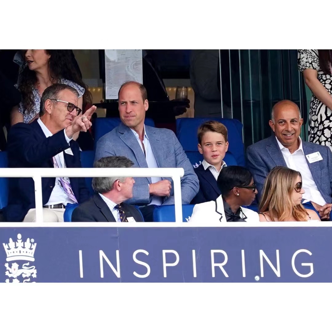 Prince William and his son are watching the football game. The father ...