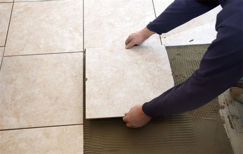 What is the difference between dry laying and wet laying of tiles? When ...
