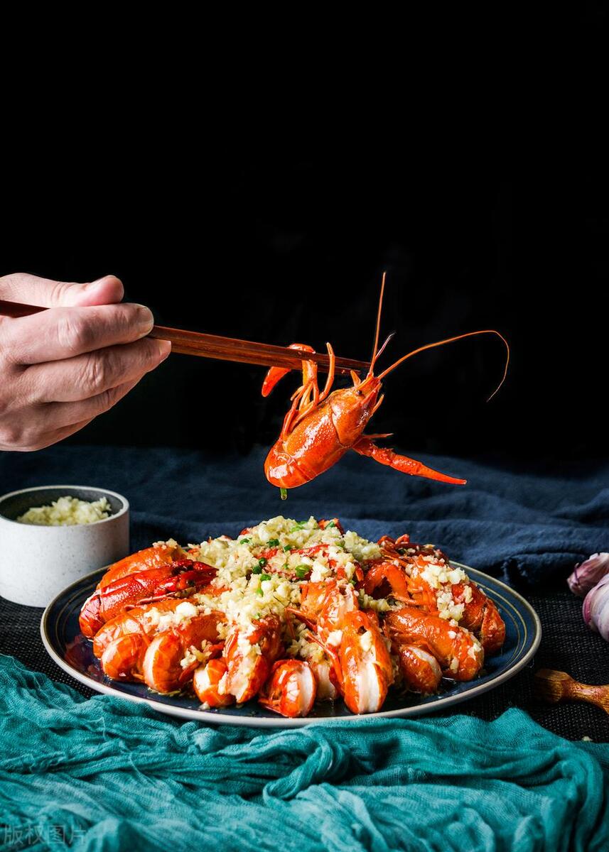 Garlic lobster, a finger-licking seafood delicacy, adults and children ...