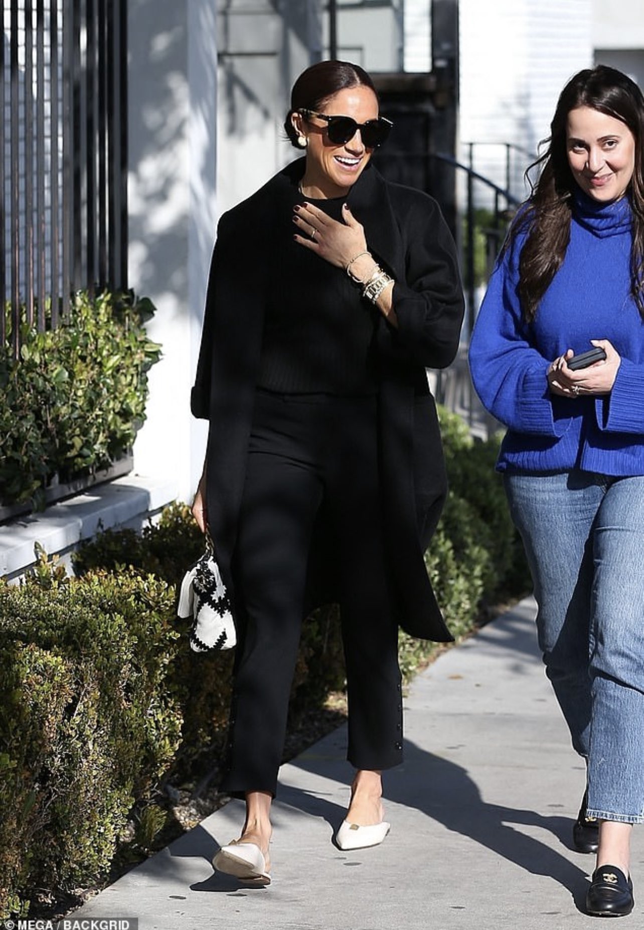 Megan was dressed in black and appeared on the street after a long ...