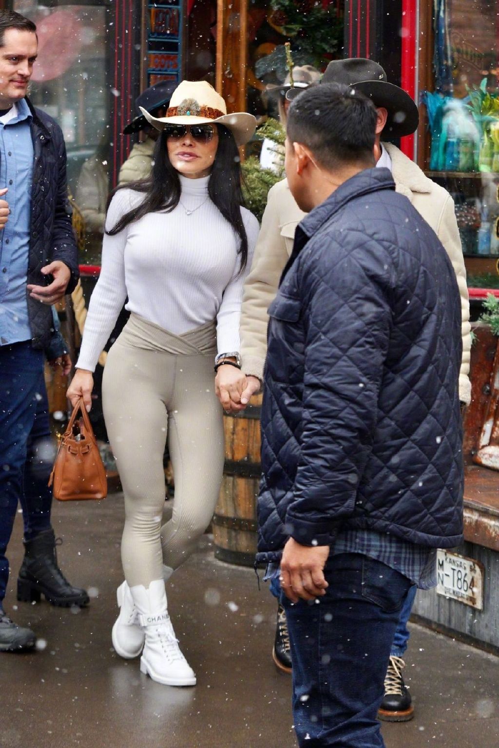 Bezos and his girlfriend Lauren Sanchez attended a party to show their ...