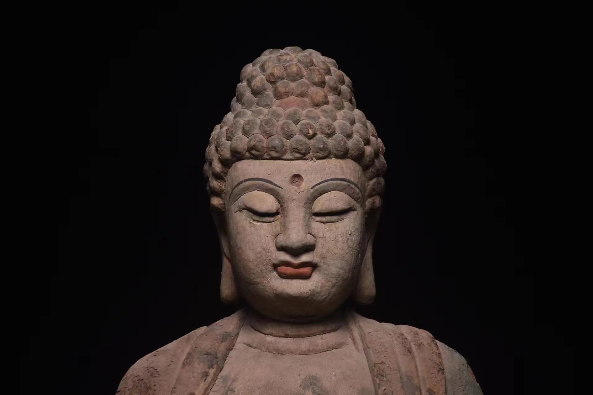 Old woodcarving [Buddha statue] - iNEWS