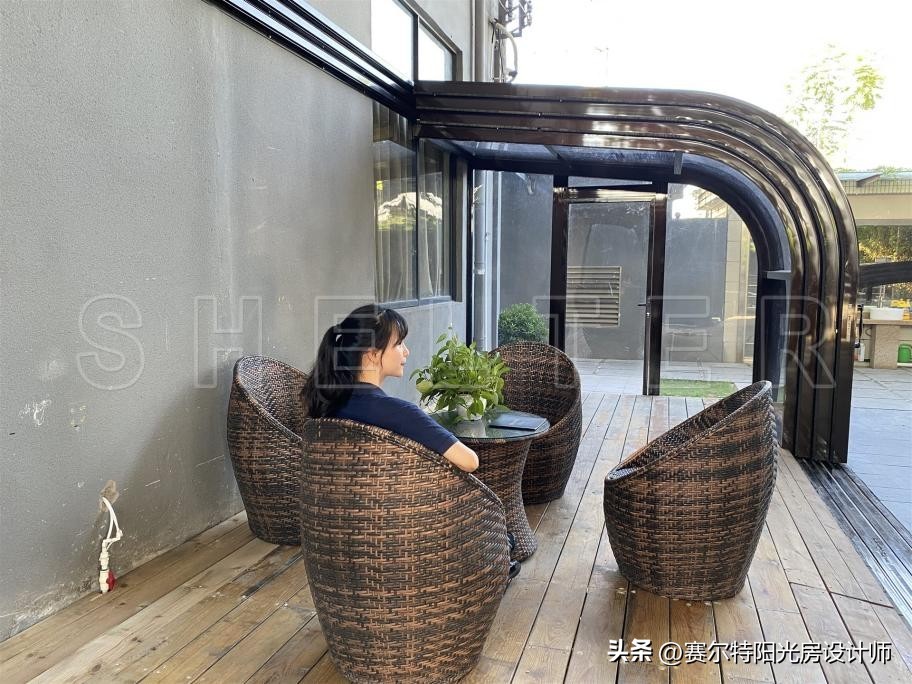 The curved sun room is built against the wall, so there are so many ...