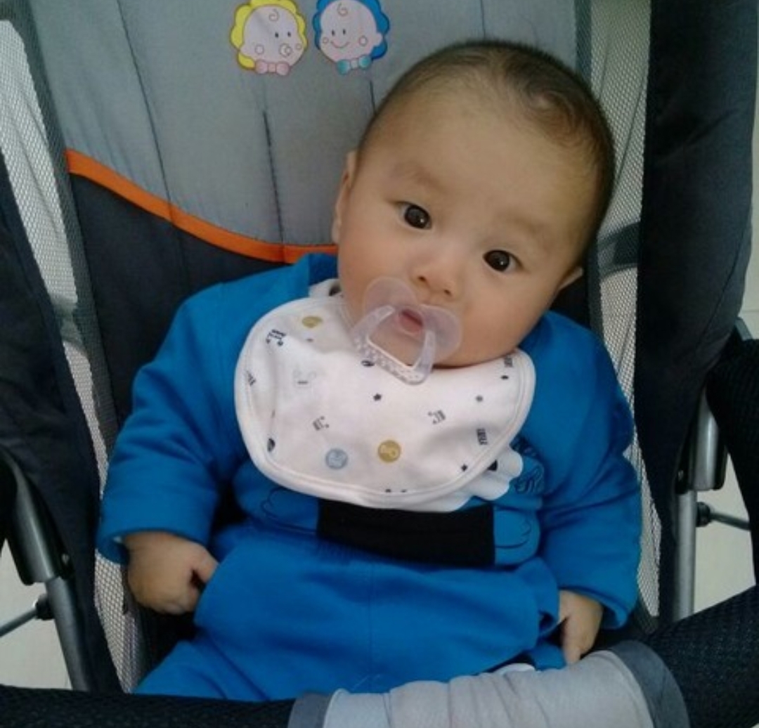 What does the "vortex" on a child's head represent?Personality or IQ?I ...