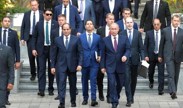 What is in the suitcase in Putin's bodyguard?There are three functions ...