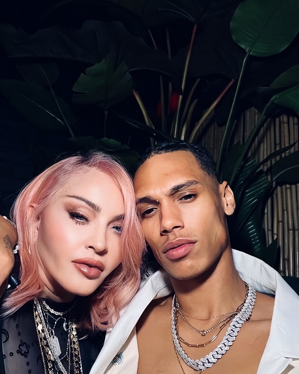 64-year-old Madonna and 23-year-old boyfriend hug their necks and take ...