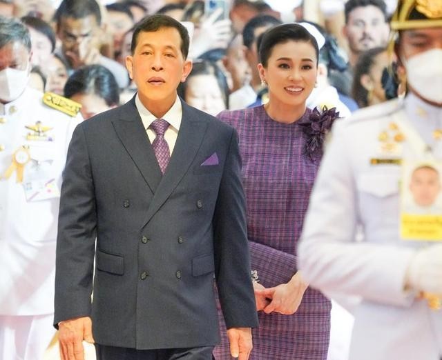 Queen Suthida looks stunning in a purple dress, and she and the 71-year ...
