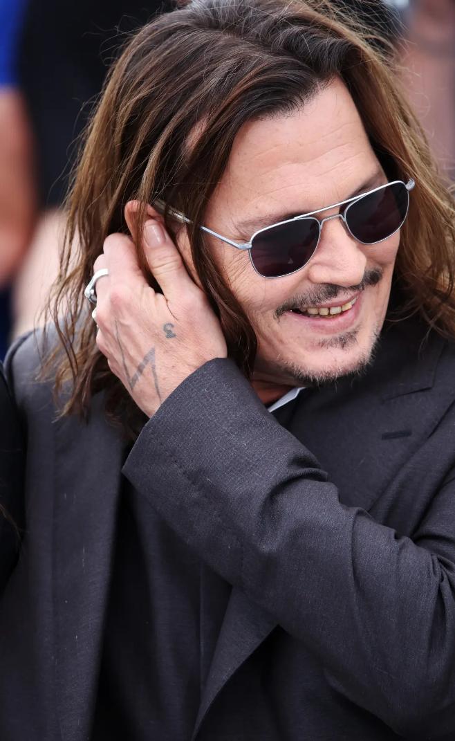 Johnny Depp once boasted he had 'rotten' teeth 'full of cavities' - iMedia