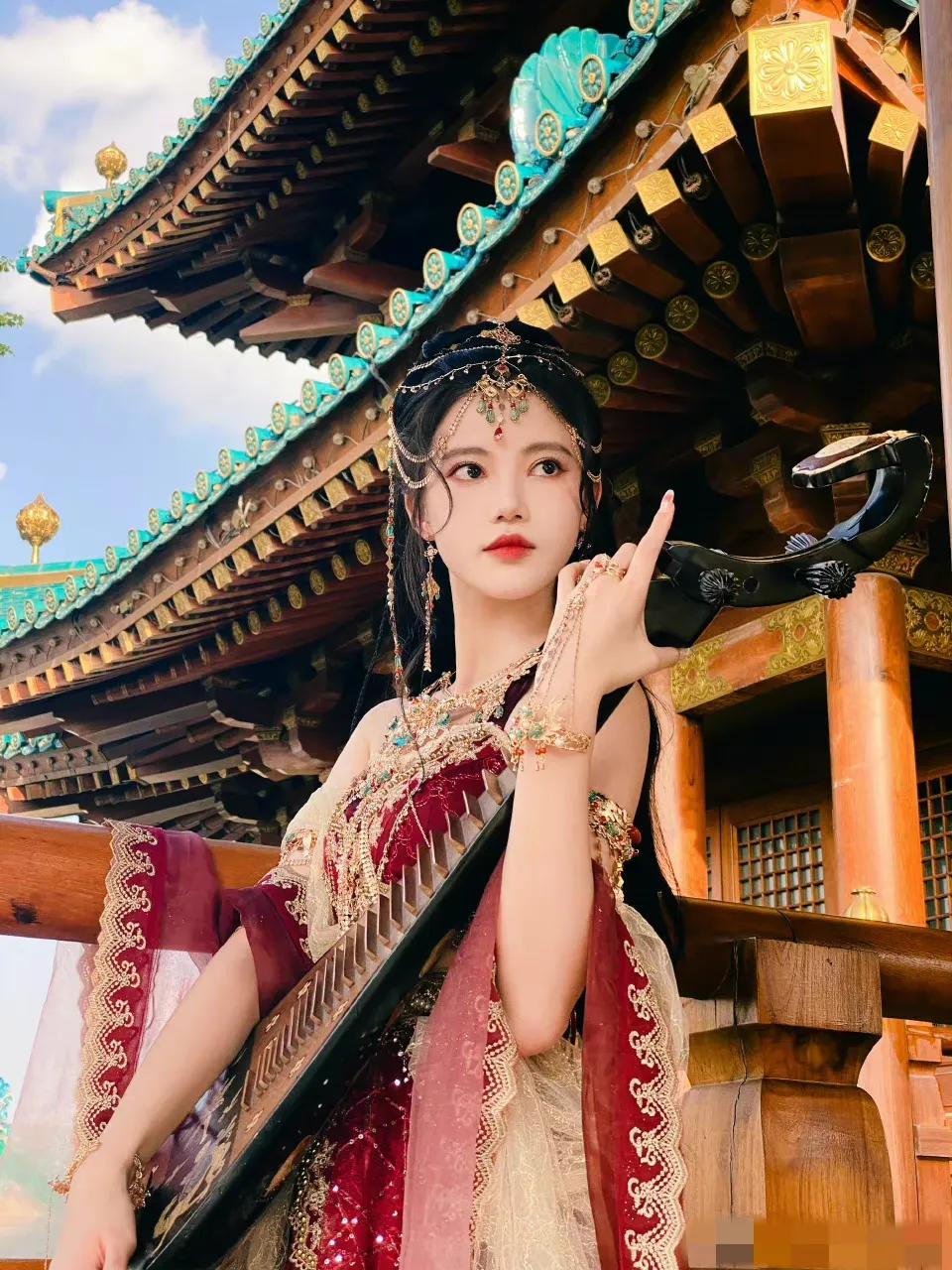 Jenny Sun's photo of the Western Regions, holding a pipa, with a ...