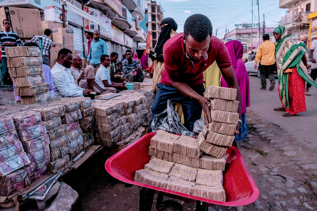 In a country that depends on "selling money" for a living, everyone is ...