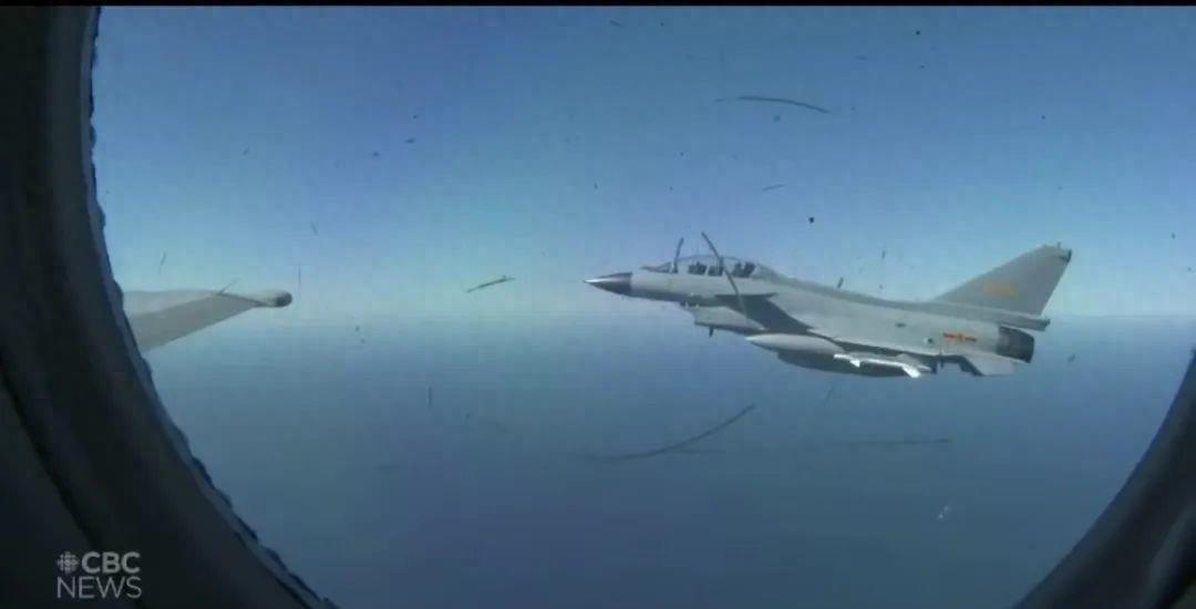 A Chinese fighter jet flew past a Canadian military aircraft at 5 ...