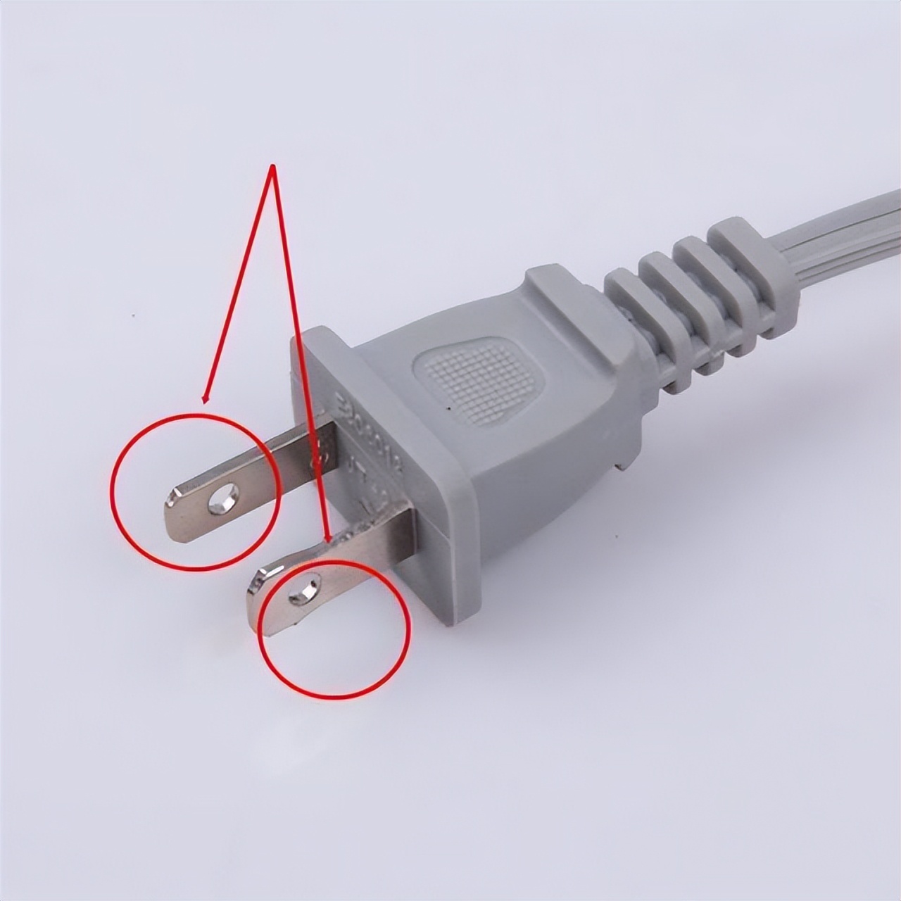 The two small holes on the plug, which seem a bit "superfluous", are ...