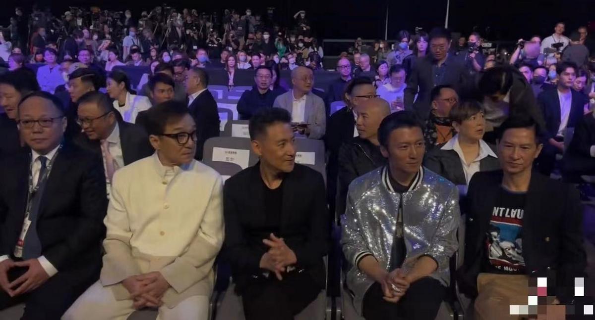 Jackie Chan, Nicholas Tse, Jacky Cheung, and Zhang Jiahui sat side by ...
