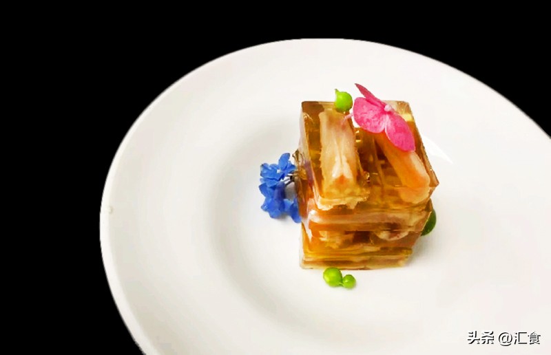 Beef in golden soup, amber duck tongue, black truffle mixed with lotus ...