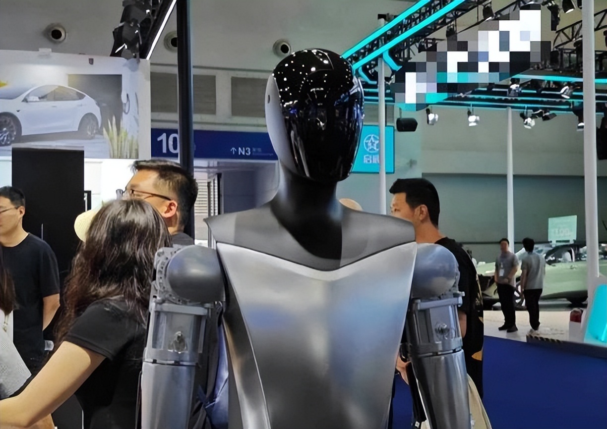 Tesla humanoid robot replaces the car model as the receptionist of the ...
