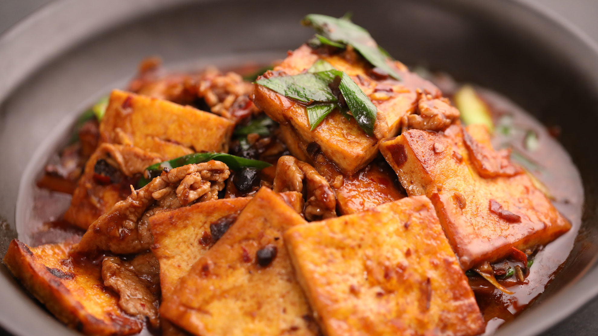 A traditional famous dish in Sichuan cuisine, the home-cooked method of ...