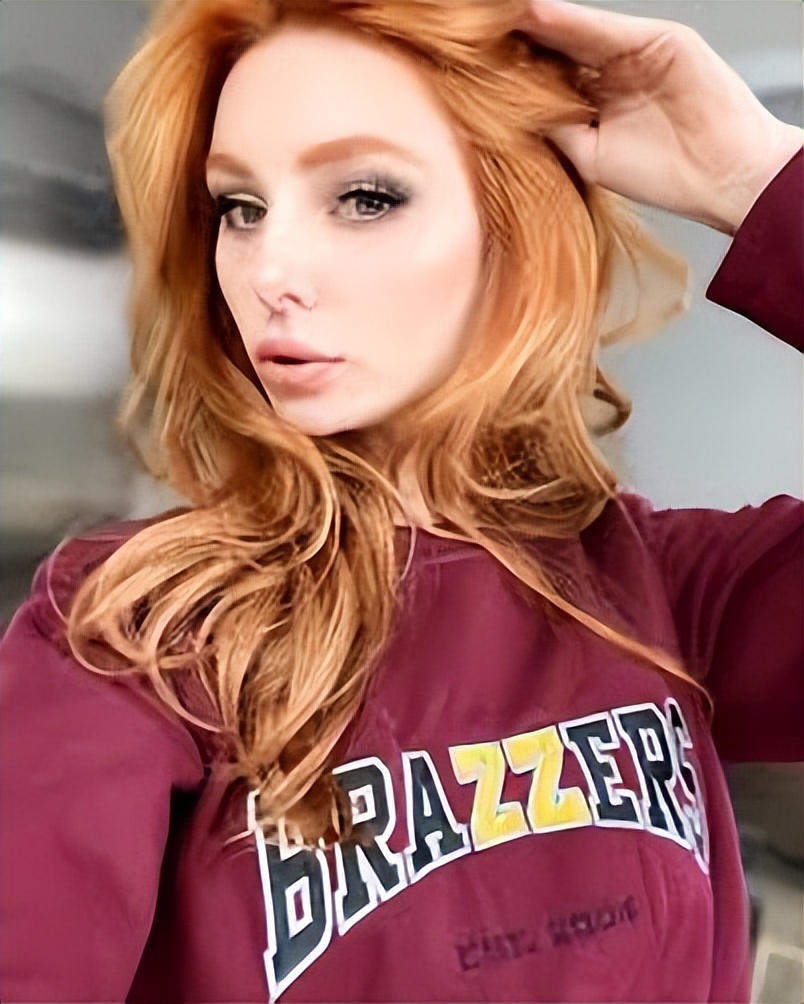 Lacy Lennon's long red hair and cute face - iNEWS