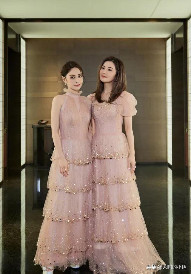 Charlene Choi and Gillian Chung fit together for a photo shoot, wearing ...