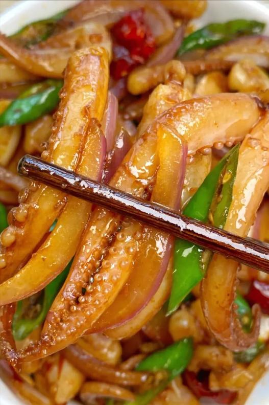 Spicy stir-fried shredded squid, charred and tender, with a combination ...