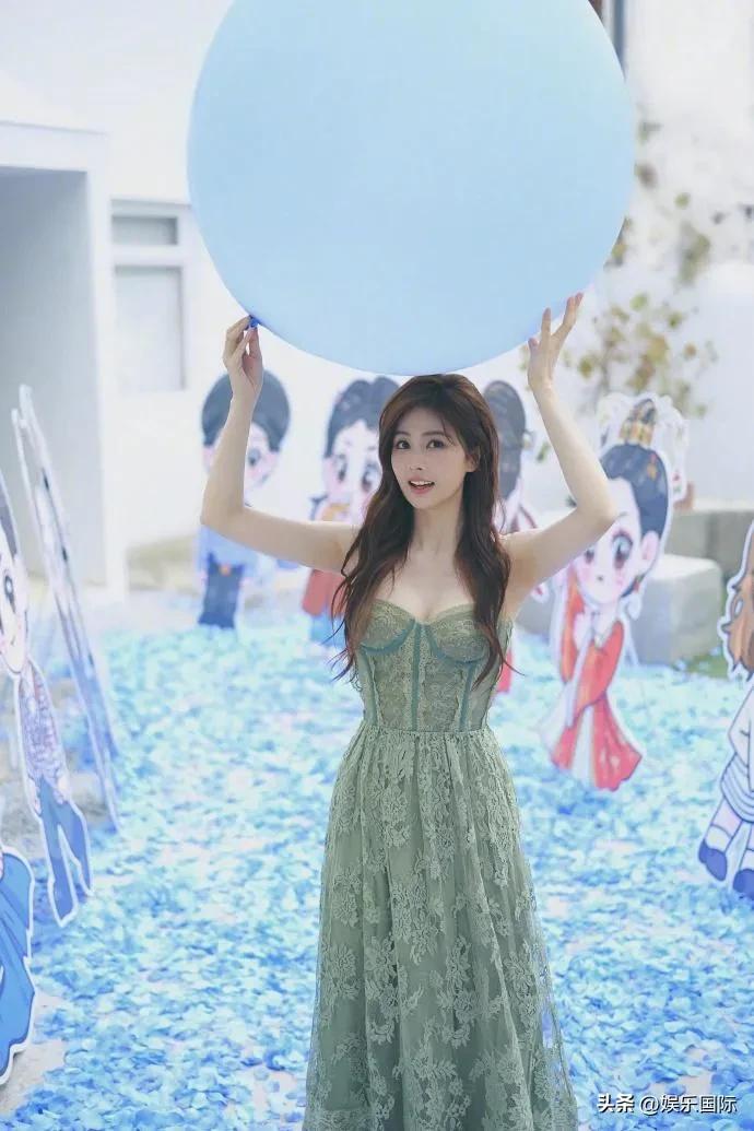 Bailu has a beautiful birthday photo wearing a light green tube top ...