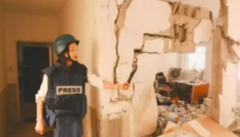 Chinese female war correspondent Chen Huihui evacuated gorgeously ...