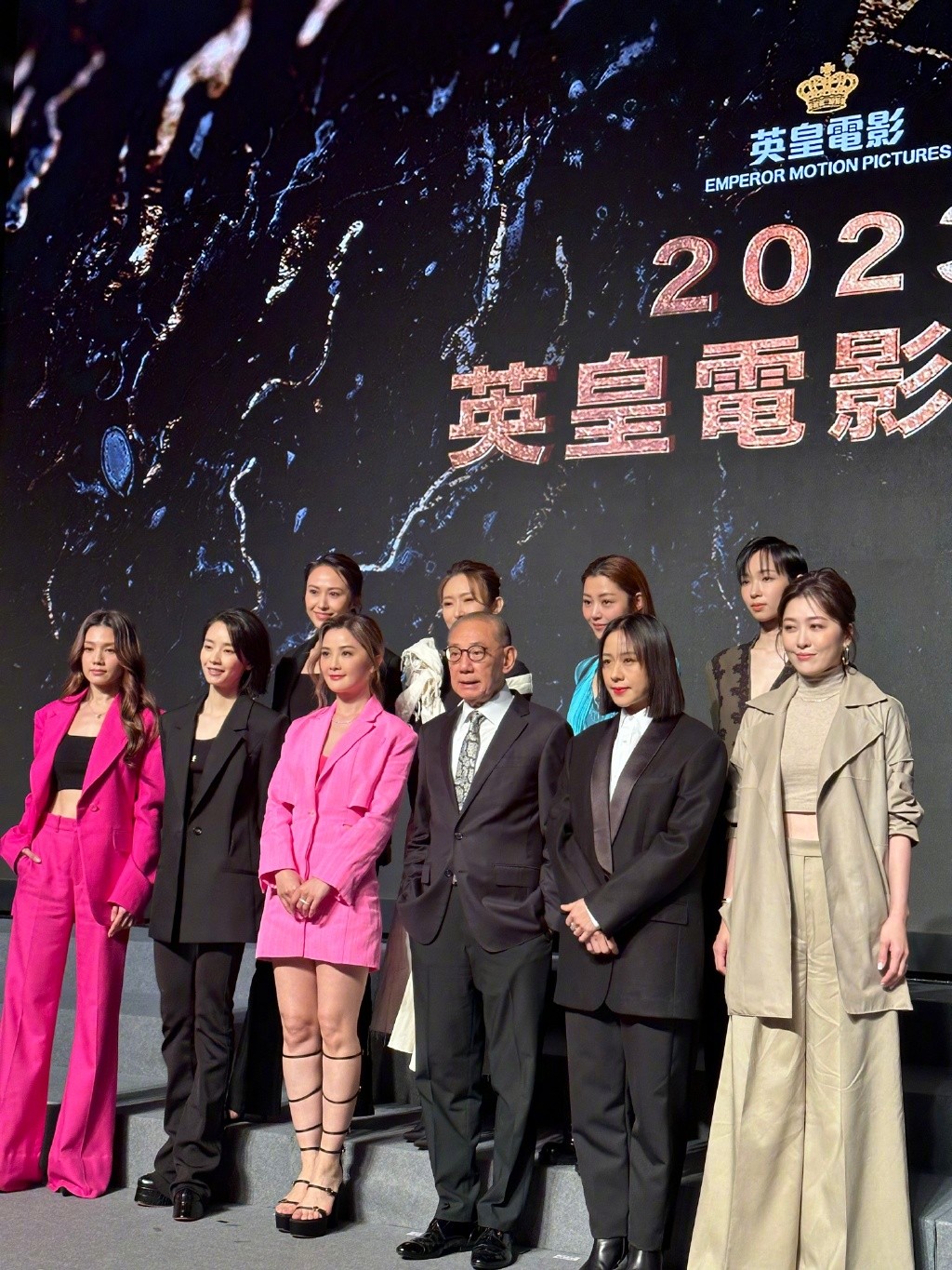 Jackie Chan, Nicholas Tse, Jacky Cheung, and Zhang Jiahui sat side by ...