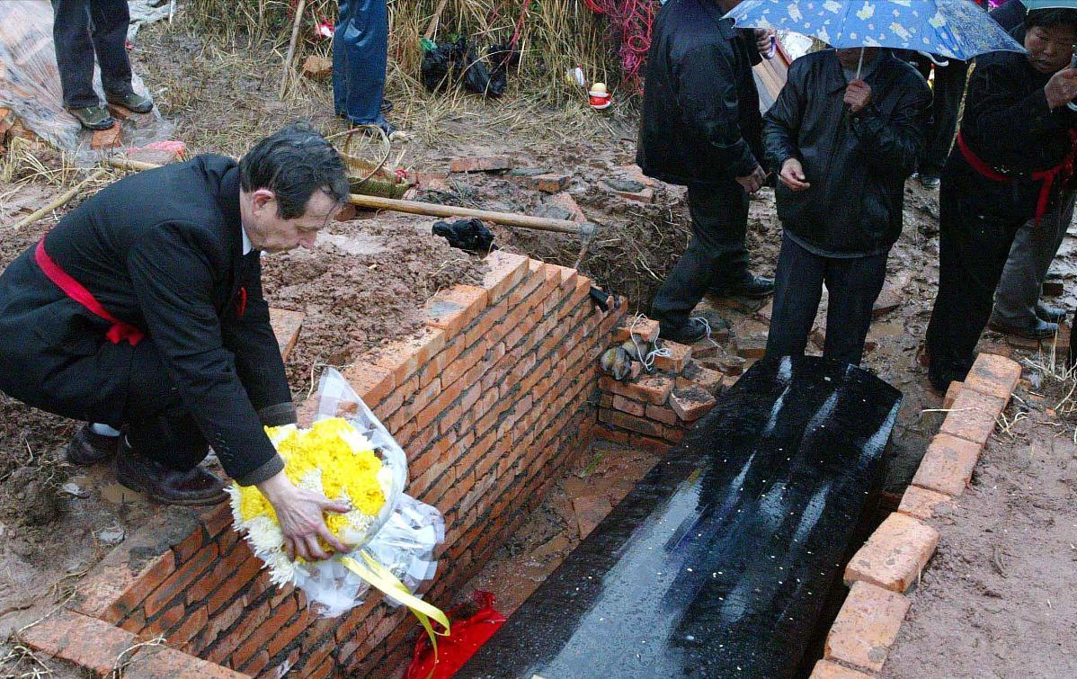 Rural funeral "strange phenomenon", some people "digging graves to ...