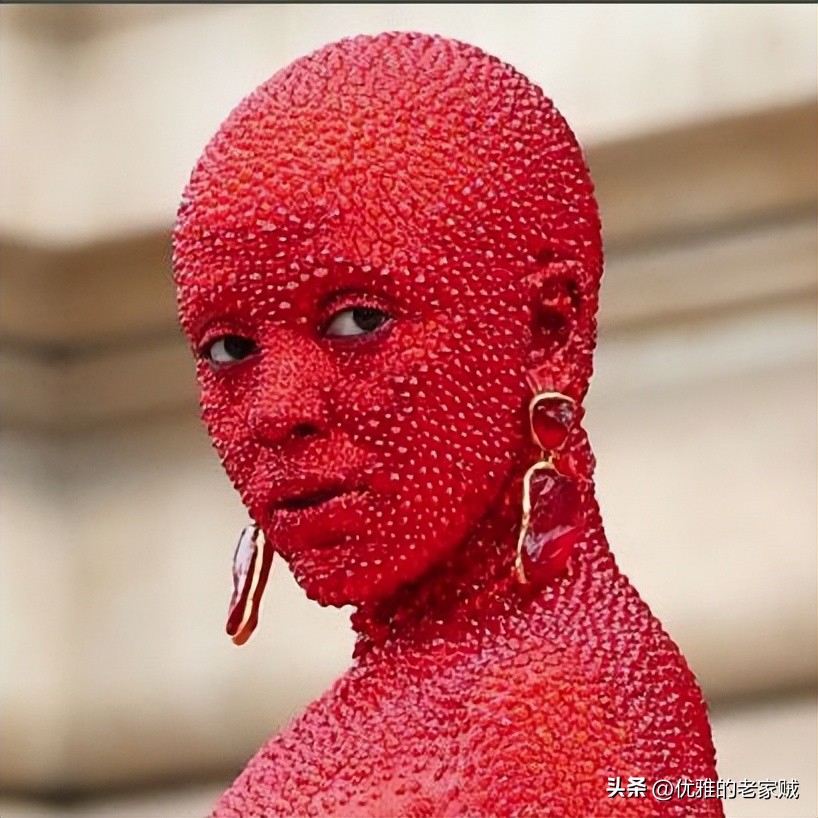 With 30,000 Swarovski crystals scattered around her body, people all ...