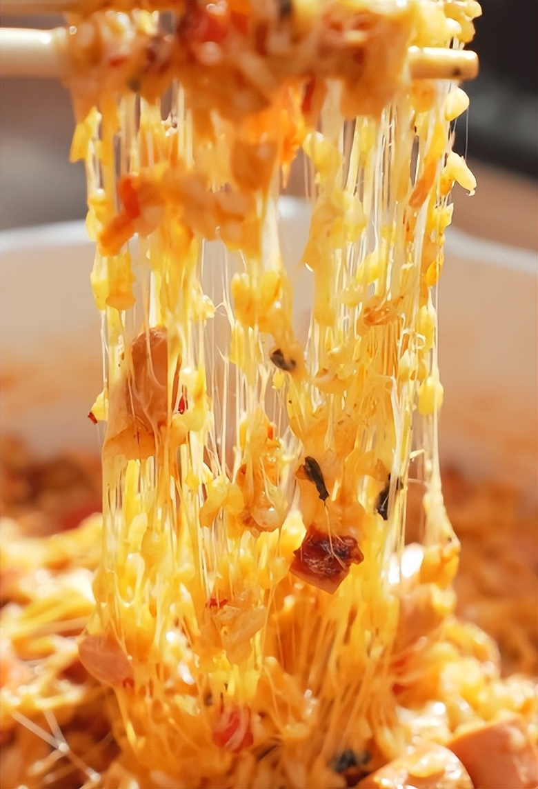 The bursting and brushed golden gong ham and cheese baked rice will ...