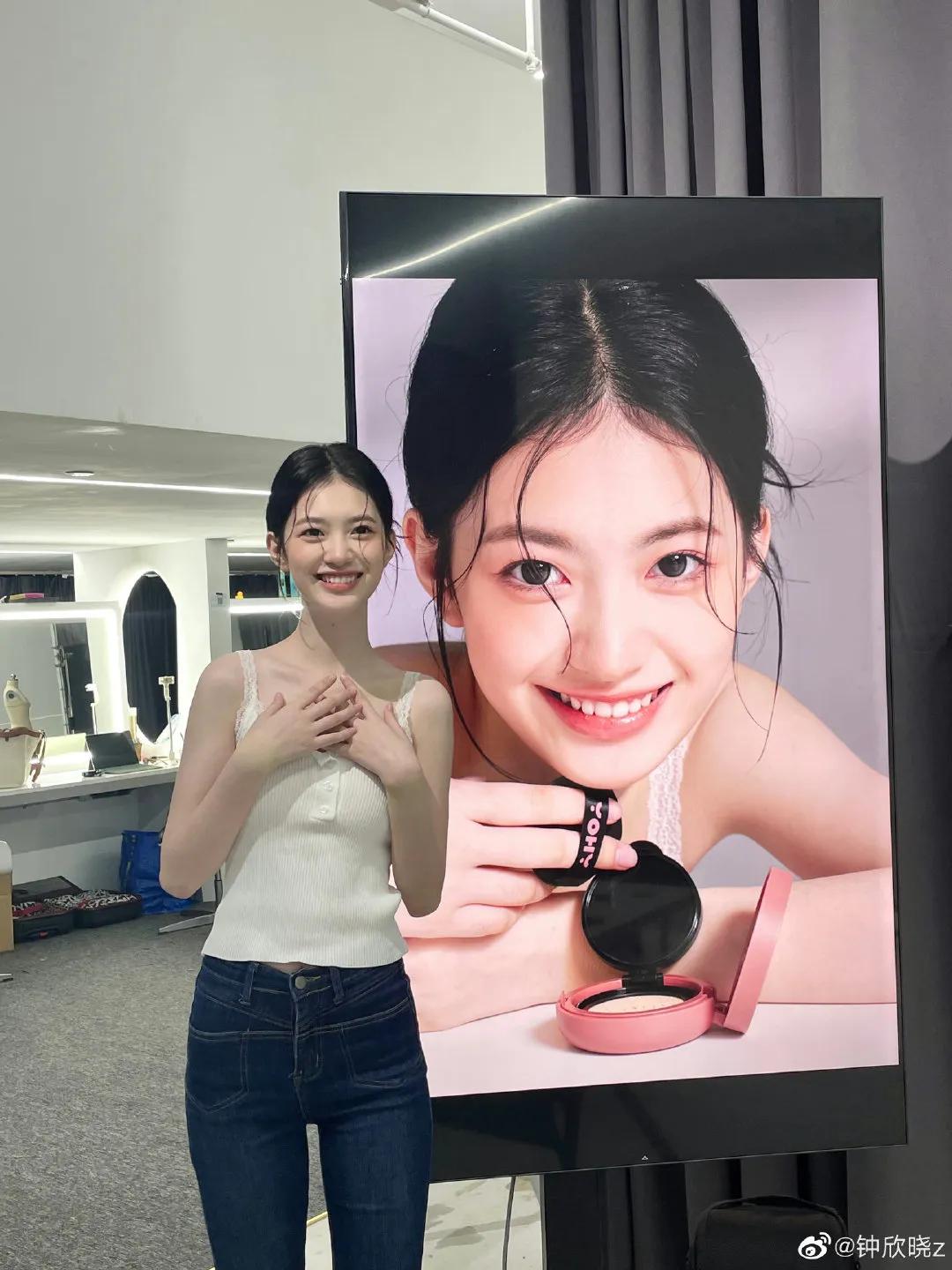 The beautiful model looks the same as the refined poster, with ...