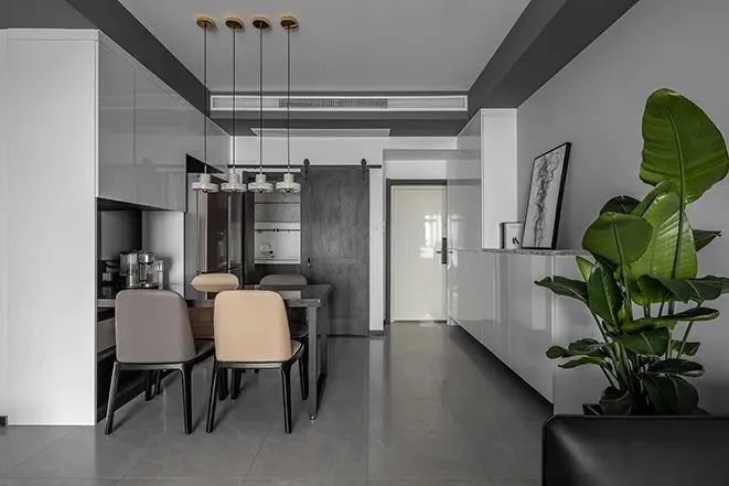 The 98-square-meter black, white and gray design is full of warmth and ...