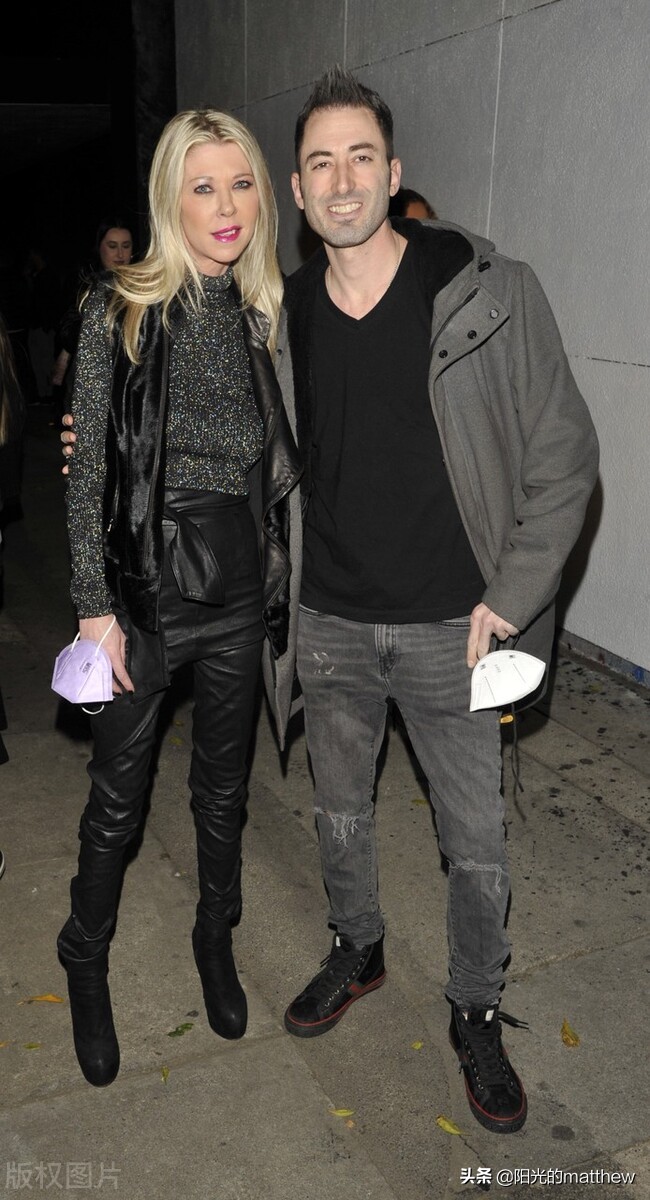 Actor Tyra Reid wears black and wears tall, attractive blonde, red lips ...