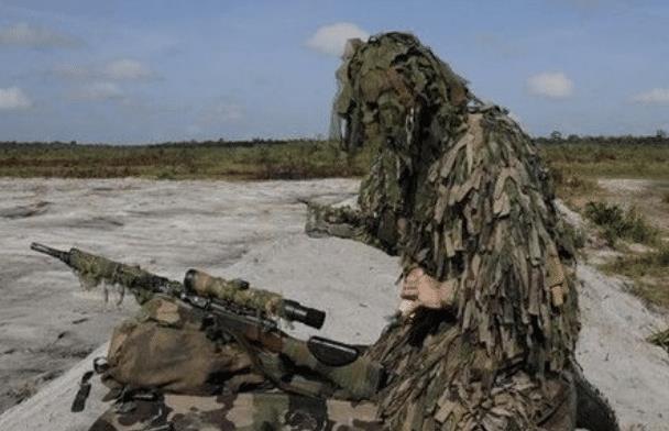 Why do snipers wrap their sniper rifles with rag strips of cloth when ...