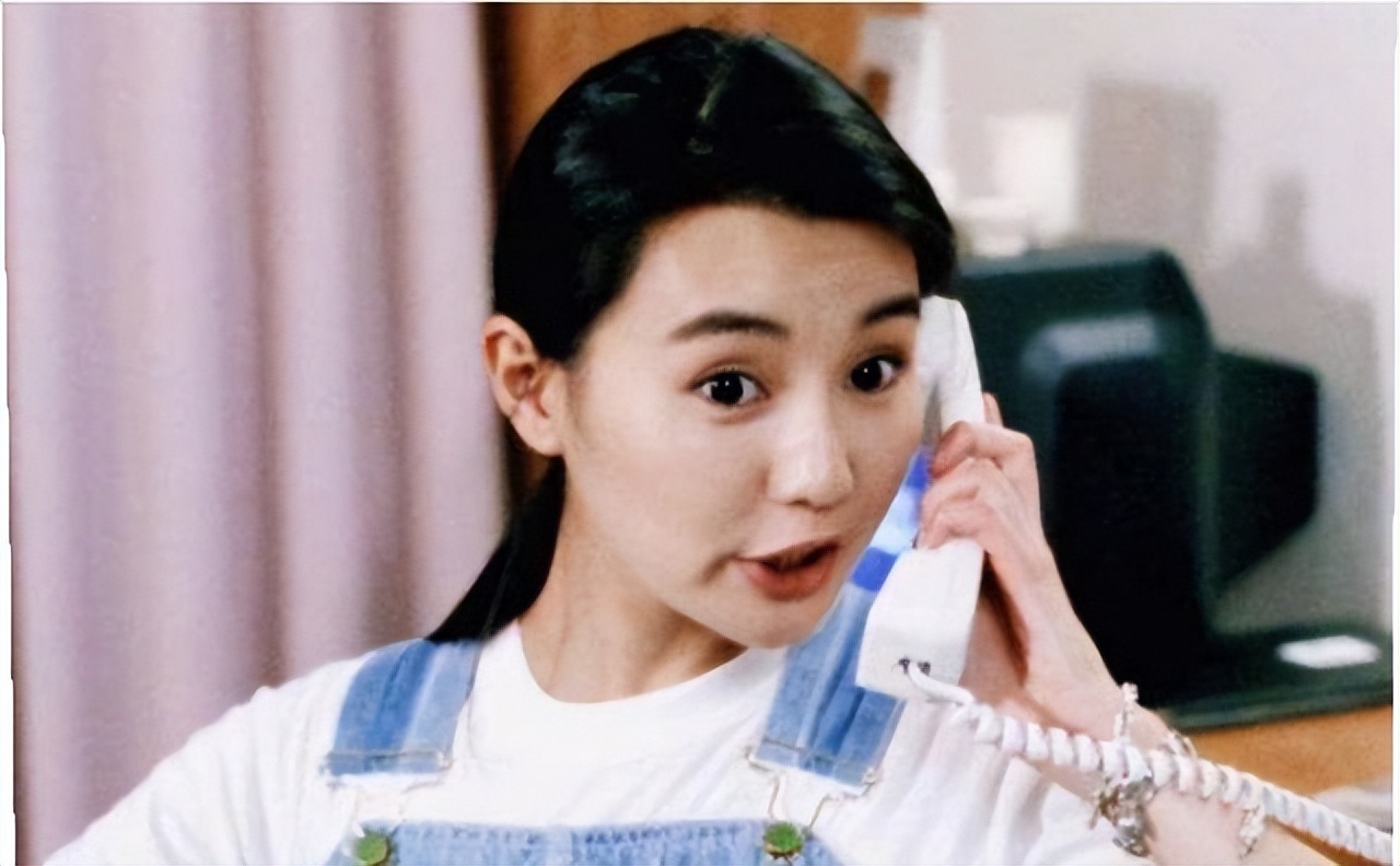 The 55-year-old Maggie Cheung is absolutely beautiful, her gorgeous red ...