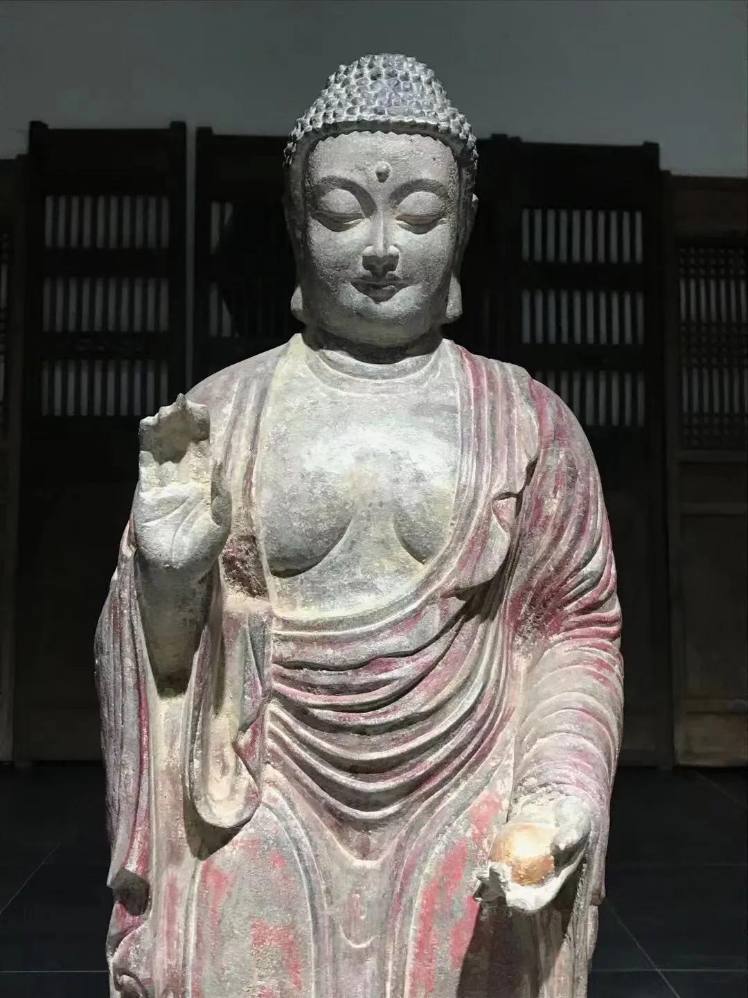 Stand Buddha. Painted bluestone, full and round face, elegant and ...