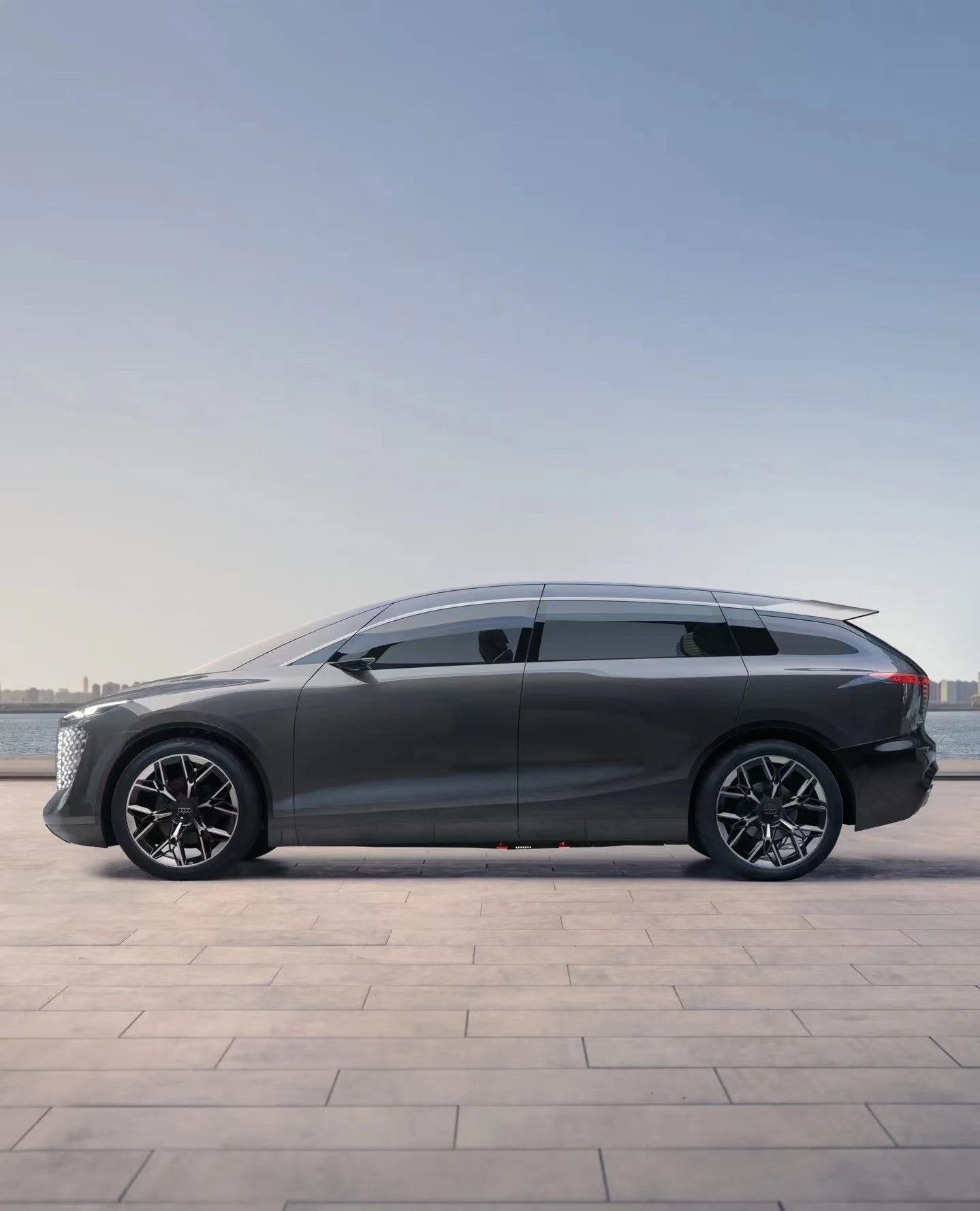 The wheelbase is as long as 3.4 meters. The four-seat design has a ...